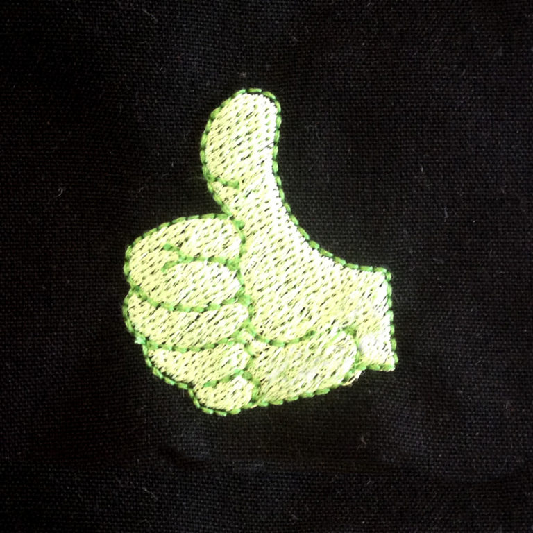 Thumbs up! It's all good with this silly applique and embroidery design ...