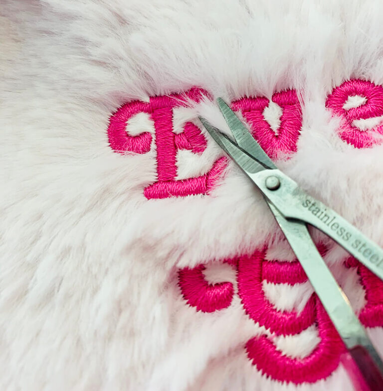 Machine embroidery on faux fur - Machine Embroidery Geek