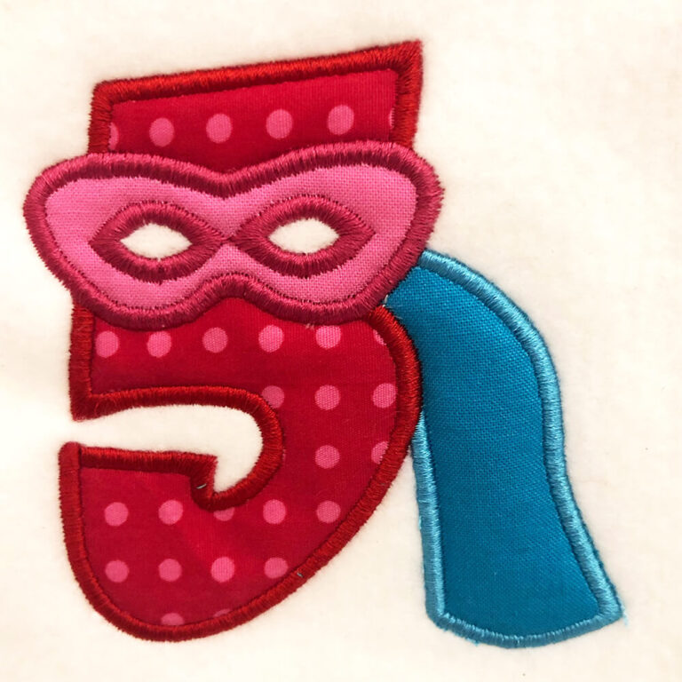 Numbers with cape and mask appliqué design